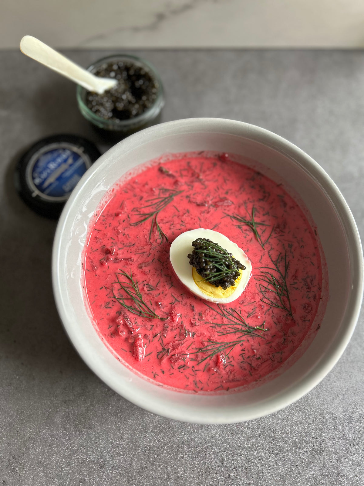 COLD BEET SOUP TOPPED WITH AN EGG AND CAVIAR– Plaza De Caviar